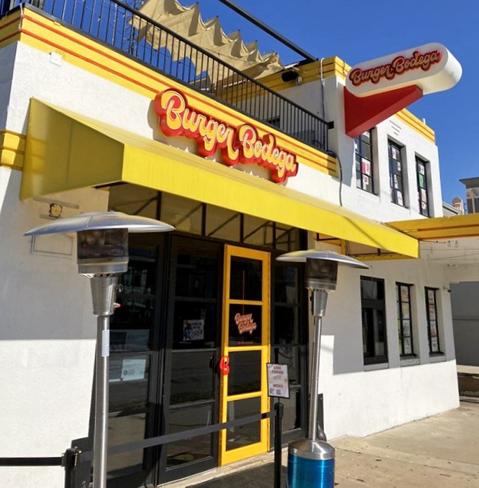 Burger Bodega's sunny yellow facade brings a slice of NYC energy to Houston's burger scene.