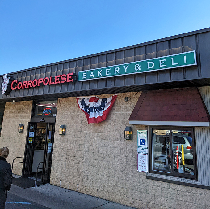 Corropolese's patriotic bunting says "We take our tomato pie seriously!" The stone facade has absorbed decades of happy sighs.