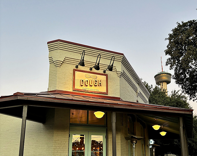 Dough's charming white brick building houses pizza perfection. This San Antonio gem elevates Neapolitan pizza without the attitude &ndash; just pure wood-fired bliss.