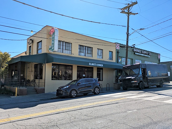 Elmo's yellow brick building stands like a beacon of breakfast hope in Durham's bustling Ninth Street district.