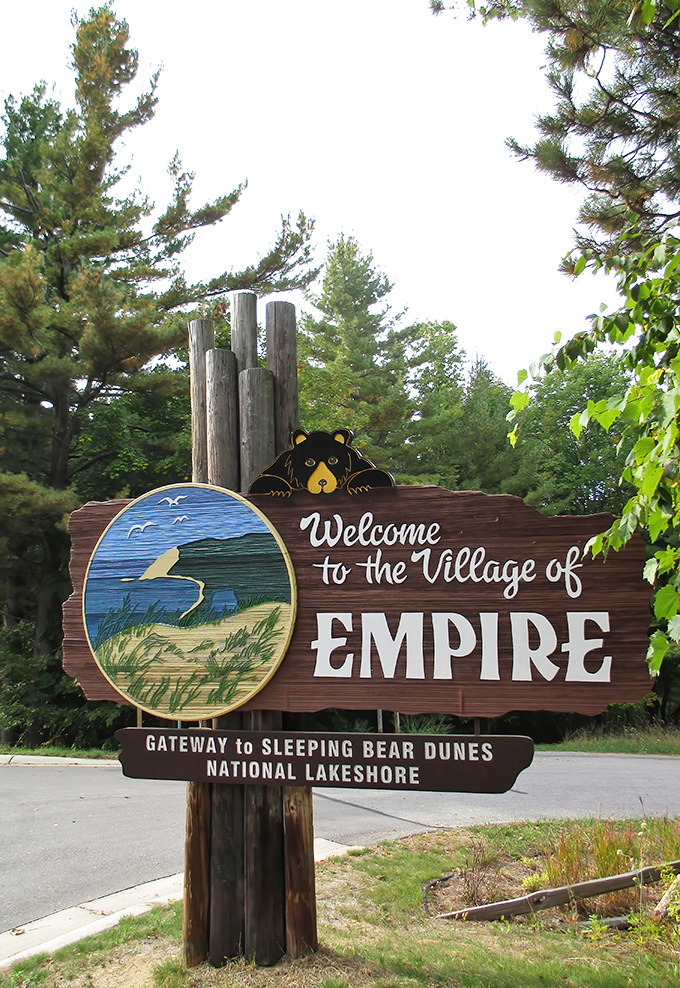 Empire: The official welcome sign to Empire, where the bear isn't sleeping and neither are the gorgeous dunes nearby.