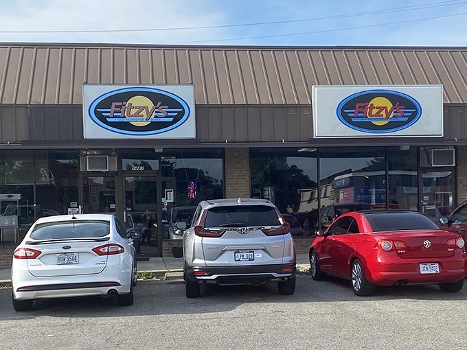 That classic diner facade says it all - clean lines, big windows, and the promise of pancakes that'll make you forget your troubles.
