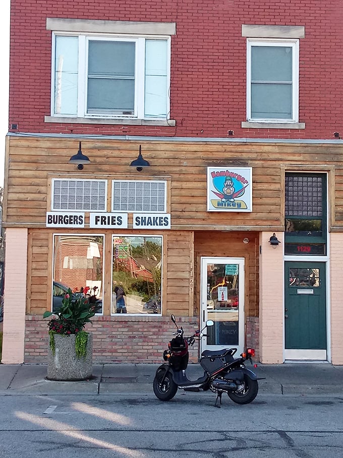 Hamburger Mikey keeps it refreshingly straightforward: "Burgers, Fries, Shakes." No false advertising here&mdash;just honest-to-goodness American classics.