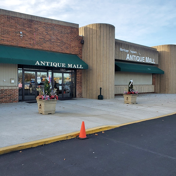 Heritage Square Antique Mall's brick-and-wood exterior hides a universe of vintage treasures. Unassuming on the outside, endless on the inside.