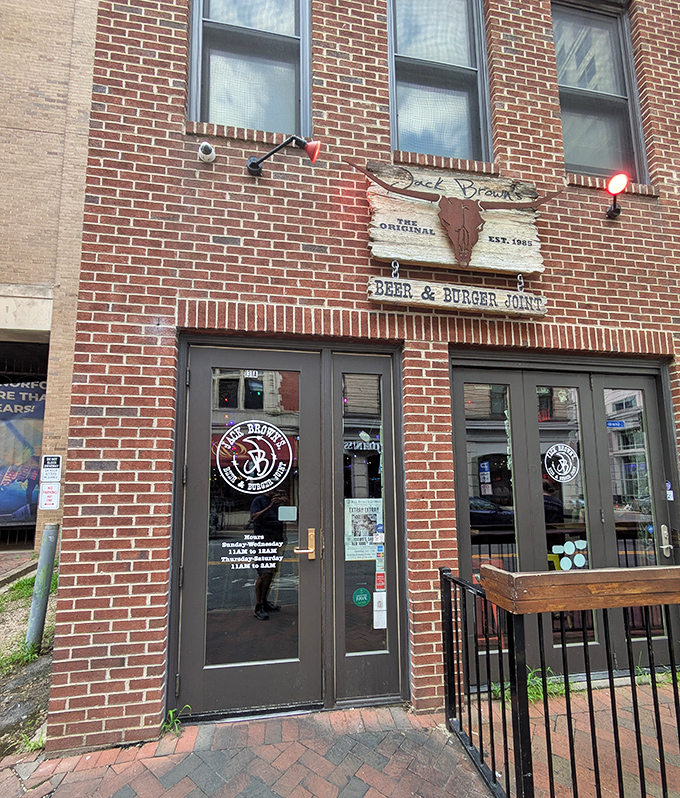 Jack Brown's wooden sign tells you exactly what matters: beer and burgers. No false advertising here&mdash;just honest-to-goodness deliciousness.