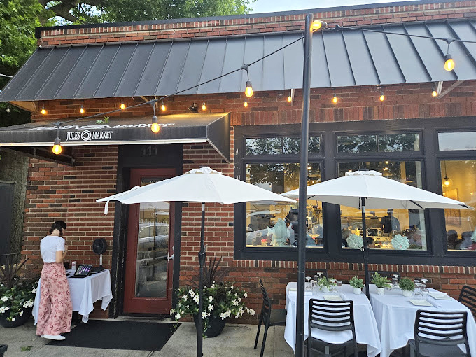 Elegant simplicity defines this Bristol gem, where white umbrellas shade conversations over exceptional seafood preparations.