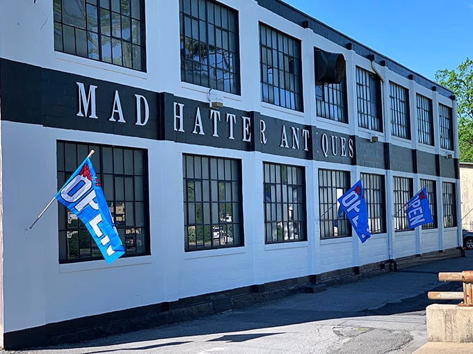 The Mad Hatter's black and white facade isn't just striking &ndash; it's practically shouting "curiouser and curiouser" to passersby!