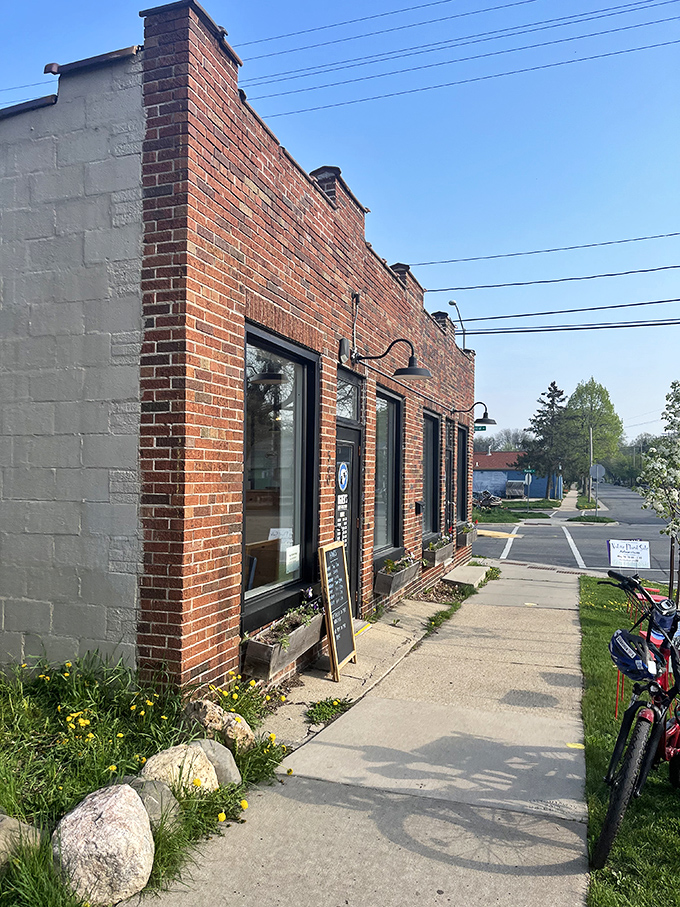 Ogden's understated brick facade hides in plain sight, like the best neighborhood secrets do. Flowers bloom while regulars sip coffee inside.