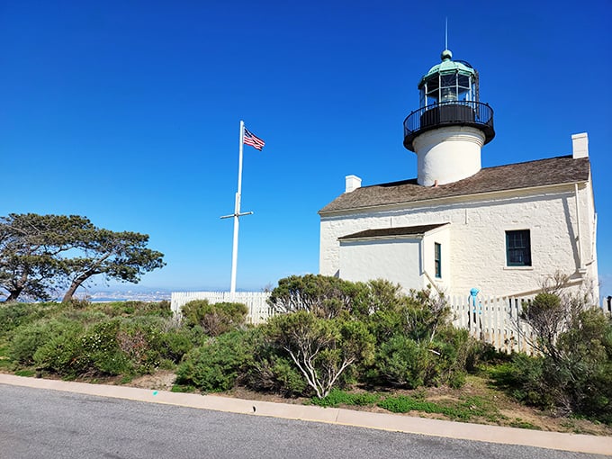 Old Point Loma's pristine white tower has witnessed centuries of maritime history &ndash; if only these walls could talk!