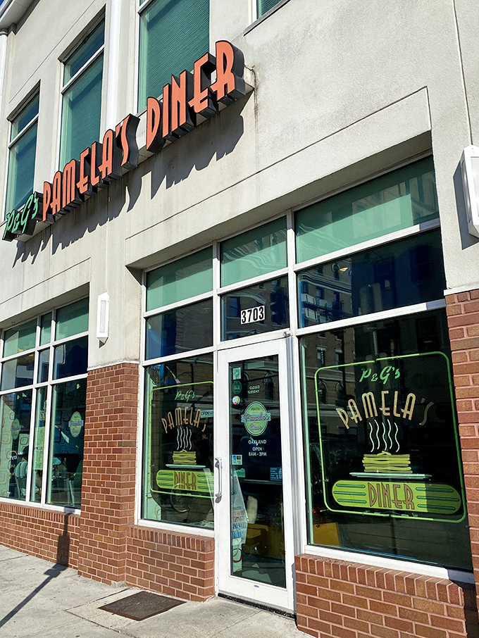 Pamela's modern storefront hides a temple of breakfast perfection. Those green-trimmed windows frame Pittsburgh's most beloved pancake destination.