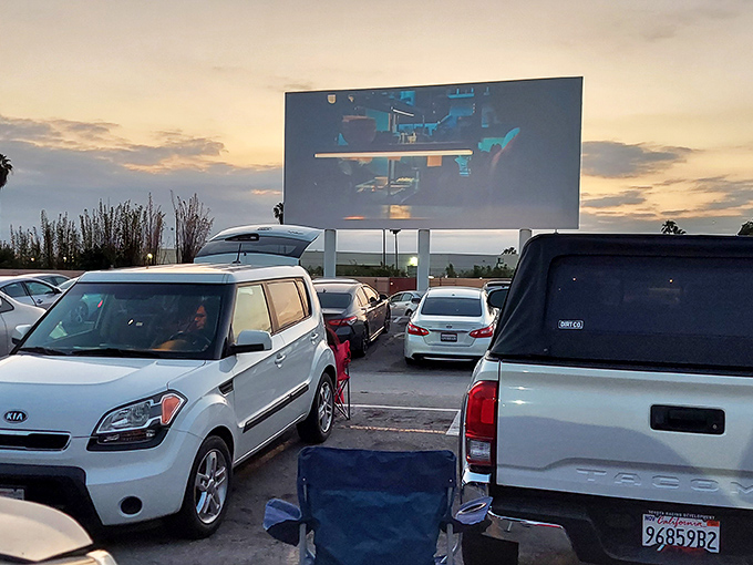 Paramount's twin screens stand ready for action as the last light of day creates the perfect movie-watching atmosphere.