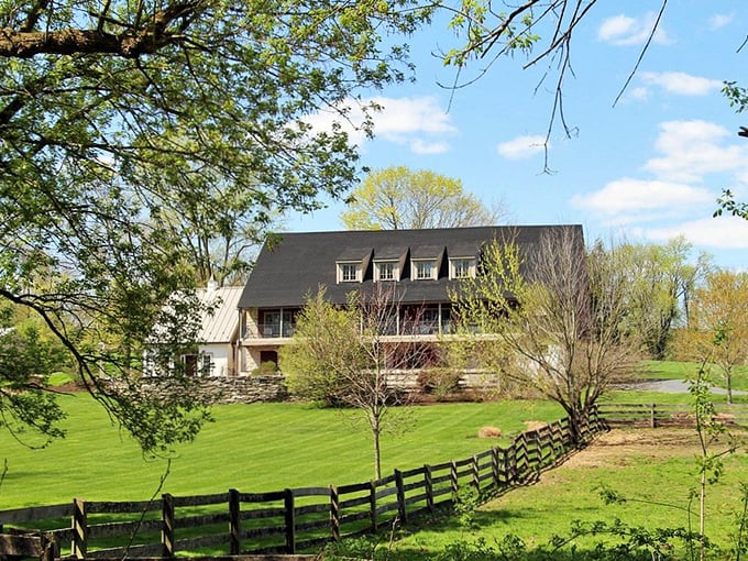 This cottage is what happens when Little Red Riding Hood grows up and gets good taste. Storybook charm with grown-up comfort.