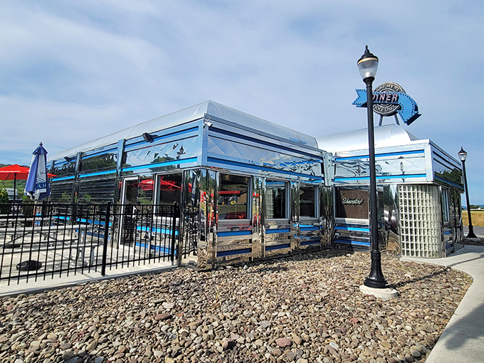 Pine Grove Diner shimmers in the sunlight &ndash; a chrome palace where breakfast dreams come true.