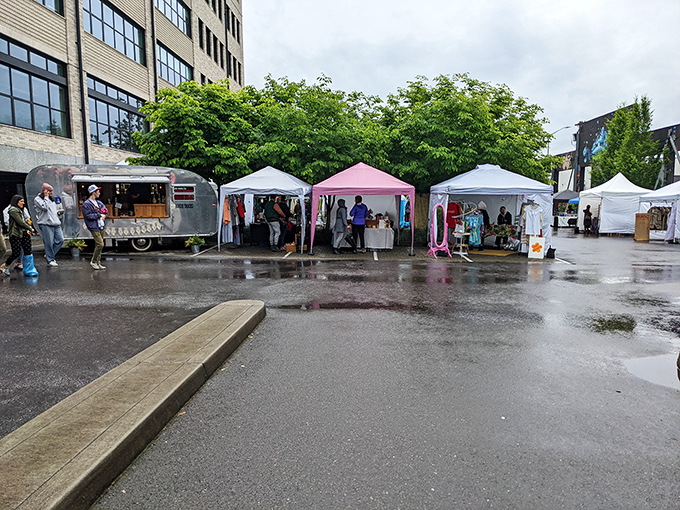 Portland Flea transforms urban spaces into a village of white-tented possibility. Even the rain can't dampen the enthusiasm of dedicated vintage hunters!