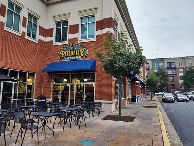 Blue awnings and big flavors! Potbelly's outdoor seating invites you to linger over that perfectly toasted sandwich.