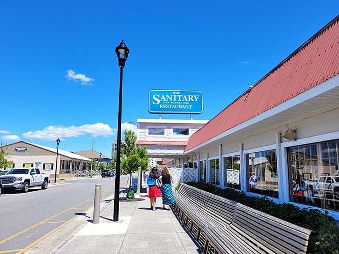 The Sanitary's iconic sign has guided hungry travelers to seafood salvation longer than most of us have had driver's licenses.