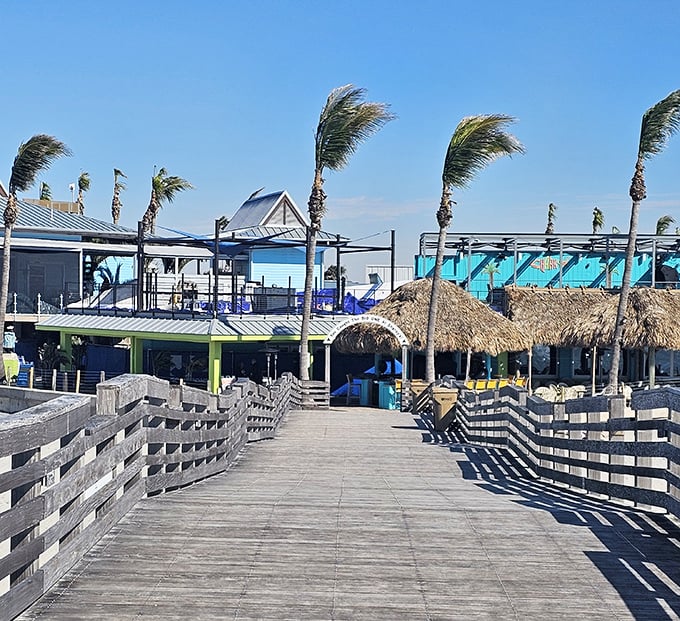 Sharky's stretches boldly over the Gulf waters, like a ship that decided to become a restaurant instead. The sunset views alone are worth the trip!