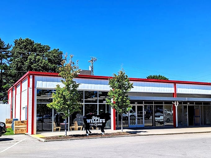 "That cow silhouette stands like a sentinel, guarding some of Tennessee's most authentic Texas-style brisket."