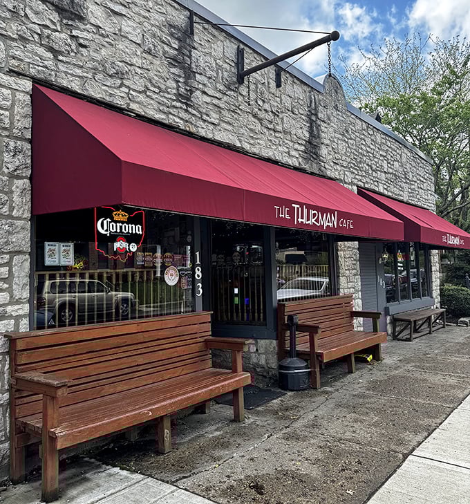 The Thurman Cafe's stone exterior and red awnings promise comfort. Inside lurks the burger that launched a thousand food challenges.