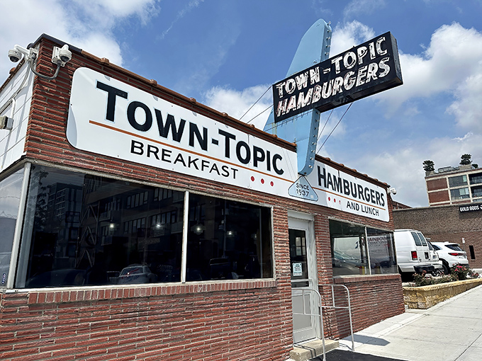 Town Topic's vintage storefront has witnessed decades of late-night cravings and midday feasts, all satisfied with perfect smash burgers.