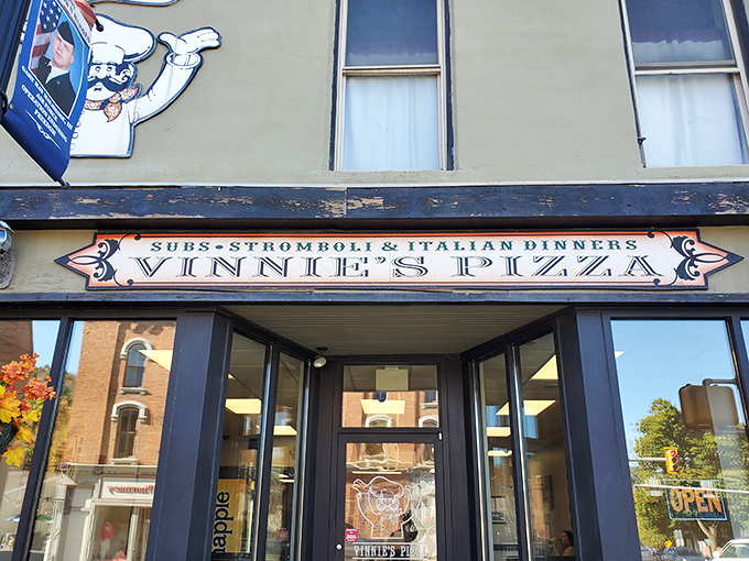 Small-town charm meets big pizza flavor &ndash; Vinnie's unassuming exterior hides Troy's best-kept secret.