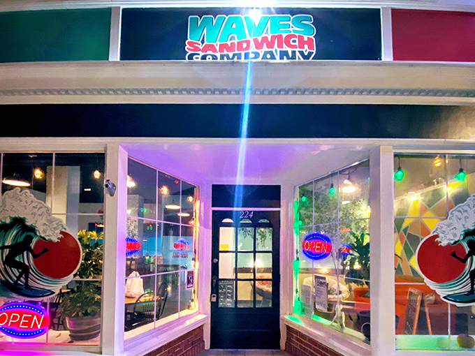 Waves' neon glow promises sandwich salvation after dark. The kind of place that makes you wonder why you ever settled for drive-thru sandwiches.