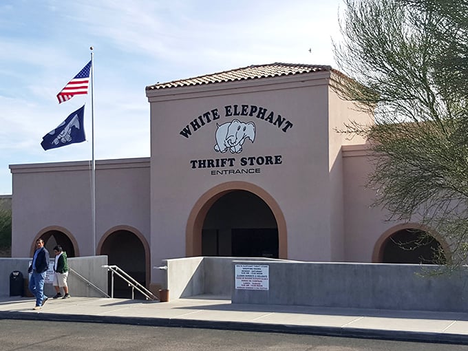 The White Elephant's Southwest-style architecture stands proudly under clear blue skies. A community landmark!