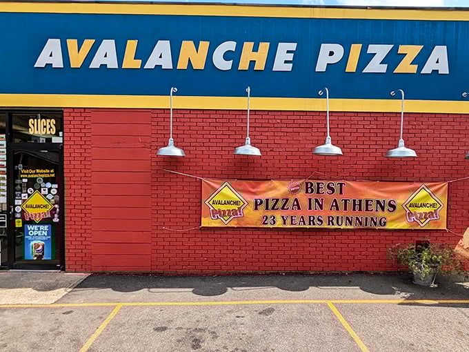 Avalanche Pizza: That giant pizza slice sign isn't false advertising &ndash; their portions are as bold as their building's paint job.