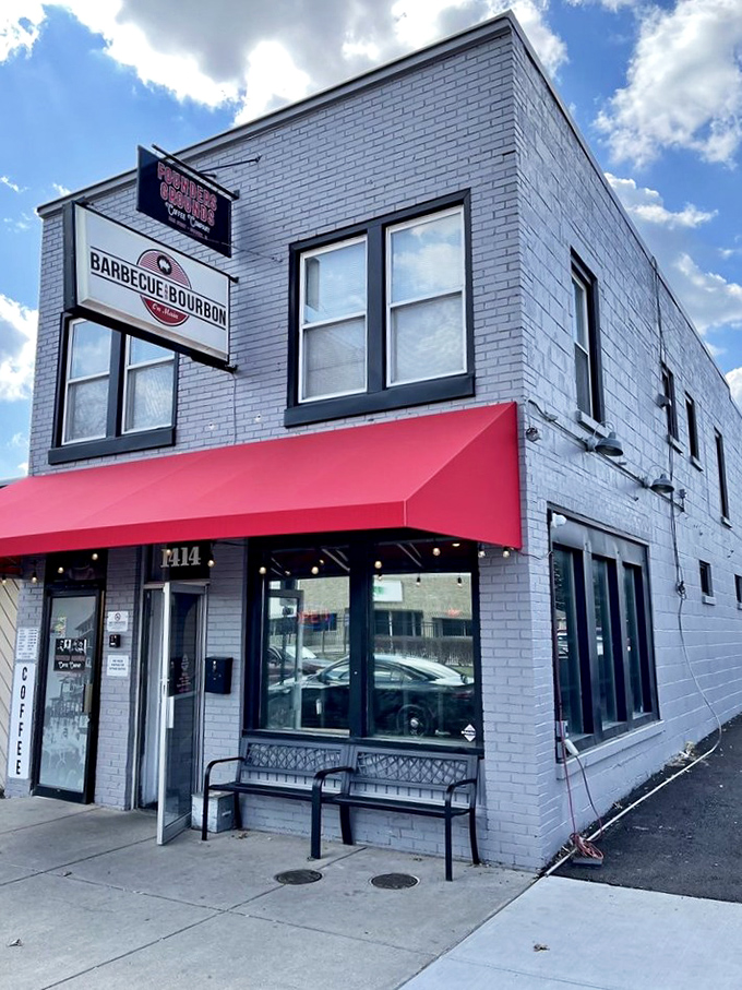 That red awning is like a finish line flag for your hunger. Speedway's BBQ gem combines smoke and spirits in perfect harmony.