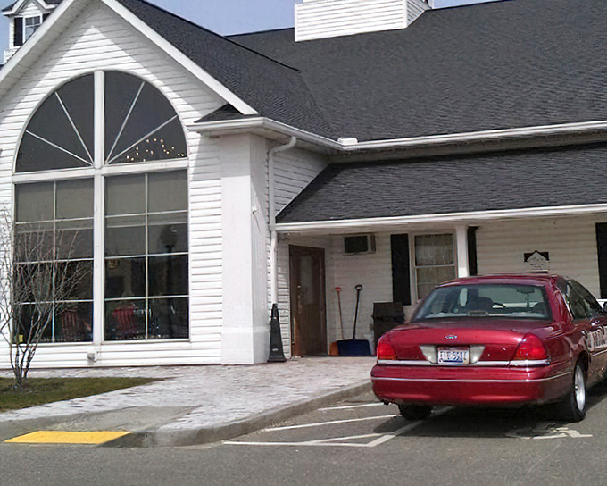 Berlin Farmstead's grand windows let natural light pour in. Architecture that says "we have nothing to hide" about their delicious cooking.
