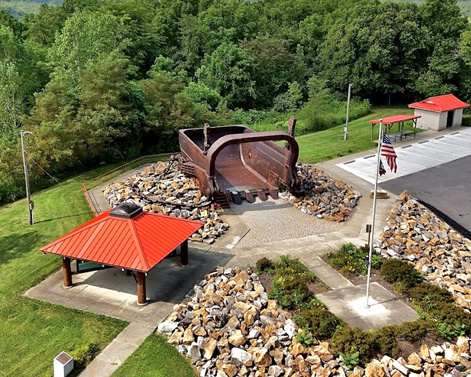 From this aerial view, the bucket's massive scale becomes clear - a monument to human engineering and determination.
