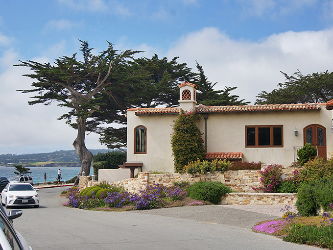 Mediterranean magic meets California coastline in this seaside Carmel home, where bougainvillea adds splashes of color.