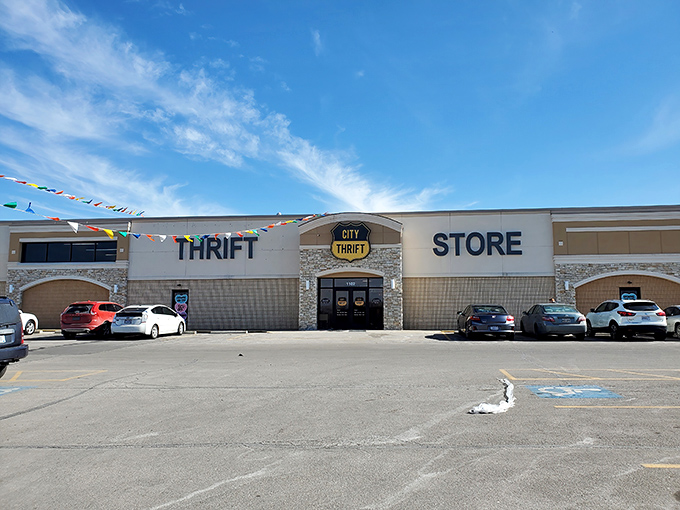 The colorful pennants outside City Thrift add a festive touch, as if celebrating the bargains waiting inside.