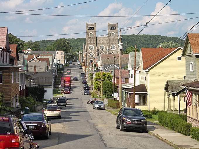 That church on the hill has been watching over this valley like a stone guardian angel since forever.