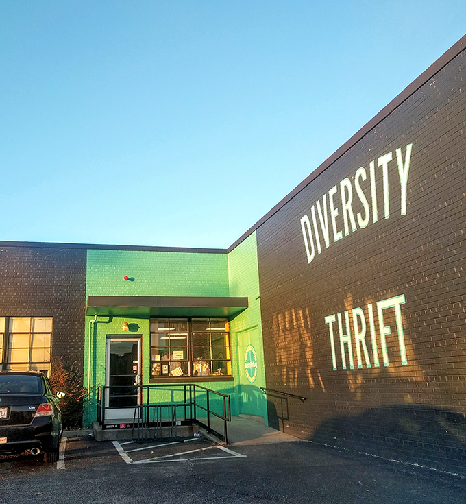 The bold green entrance and stark black walls make a statement as unique as the finds inside.