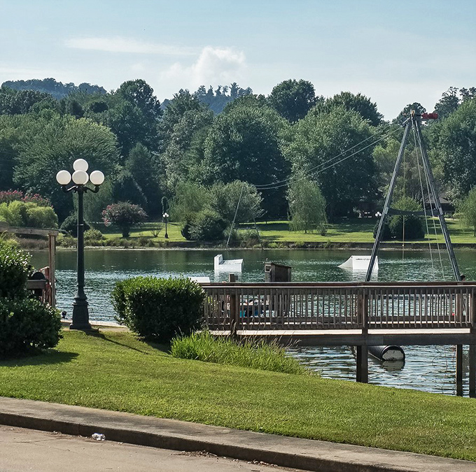 Postcard-perfect park scene! Hiawassee's lakeside walkway invites you to stroll, sit, and soak in mountain views that no filter could improve.
