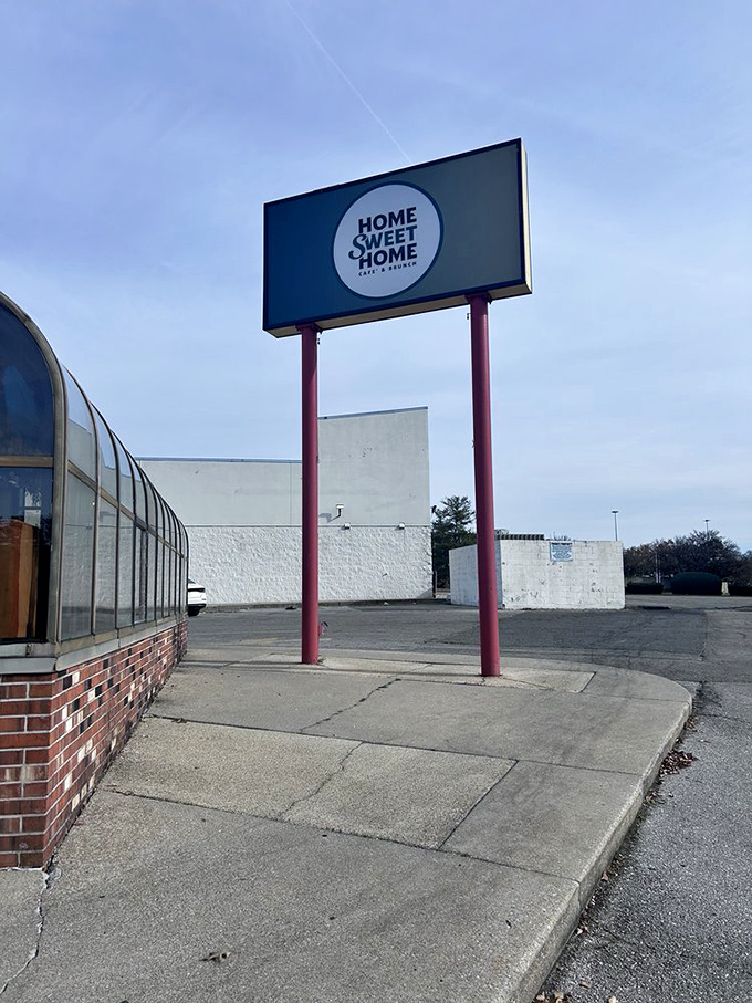 That simple sign on a pole? It's HomeSweetHome's quiet way of saying "the pancakes inside are worth the detour."