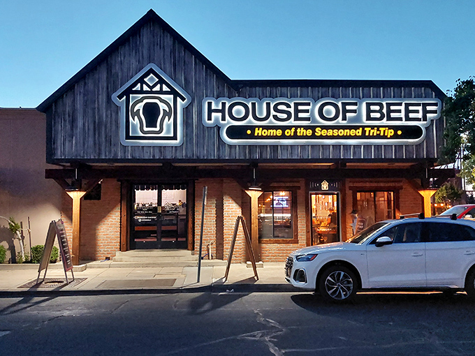 This rustic barn-style exterior promises down-home cooking where seasoned tri-tip takes center stage in every delicious bite.