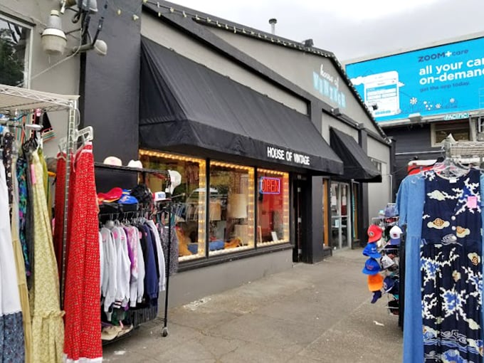 Racks of colorful clothing spill onto the sidewalk outside House of Vintage. Window shopping becomes sidewalk shopping when the deals are this good.