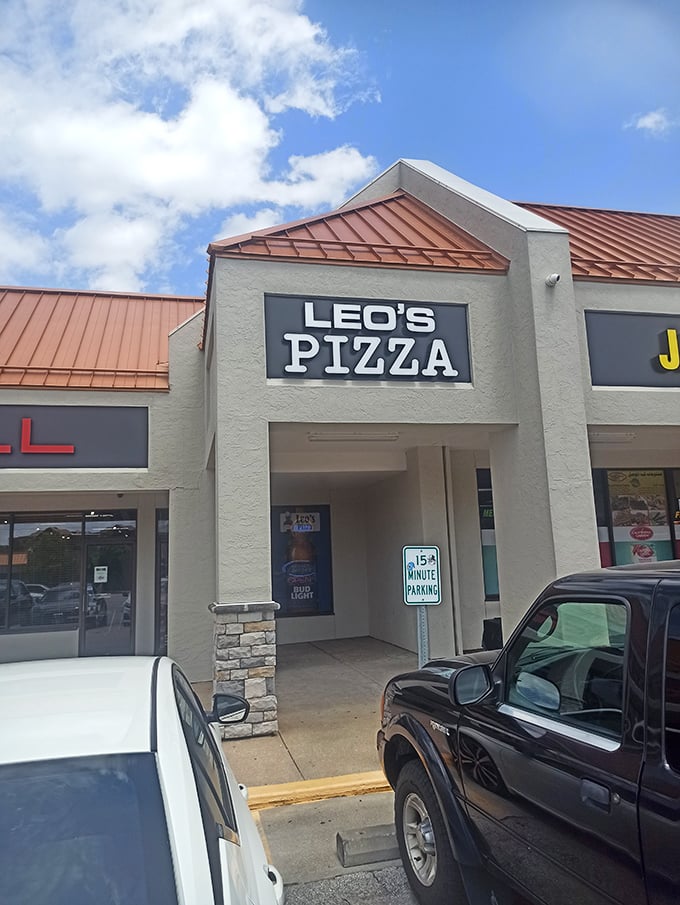 The new Leo's sign might be sleek, but inside it's still all about that hand-tossed crust that's been winning Kansas City hearts for years.