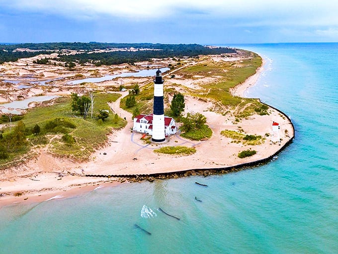Ludington: The lighthouse standing guard over waters so blue they look Photoshopped. Nature's showing off again in Pure Michigan.