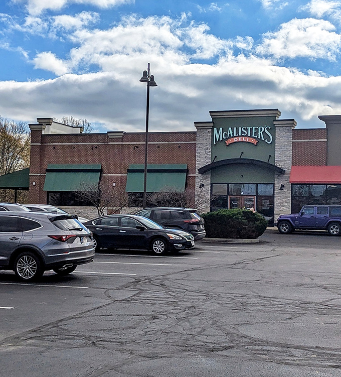 The stone and brick exterior of McAlister's stands ready to shelter sandwich pilgrims seeking refuge from boring lunch options.