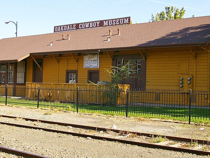 The Oakdale Cowboy Museum preserves the town's western legacy, housed in a historic yellow train depot.