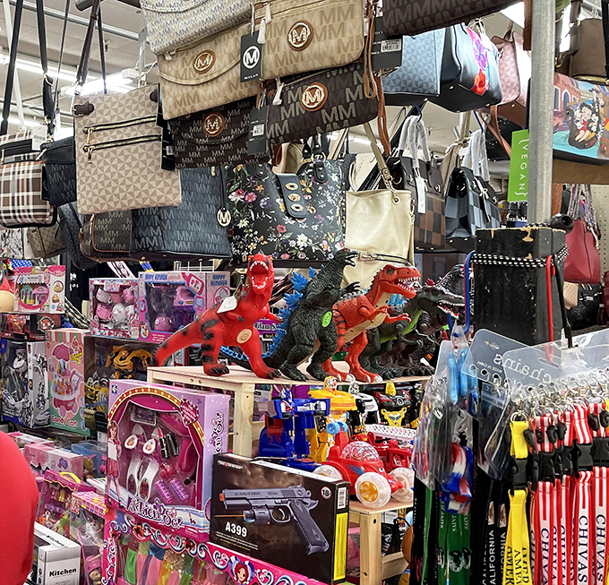 Oregon Flea Market: where handbags hang like exotic fruit and dinosaurs guard the entrance to bargain paradise.