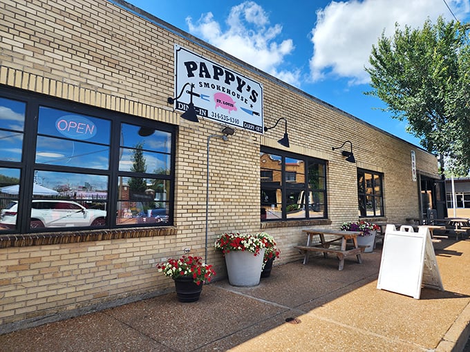 Flower pots and picnic tables hint at the homey experience waiting at Pappy's &ndash; Missouri's temple of smoke and flavor.