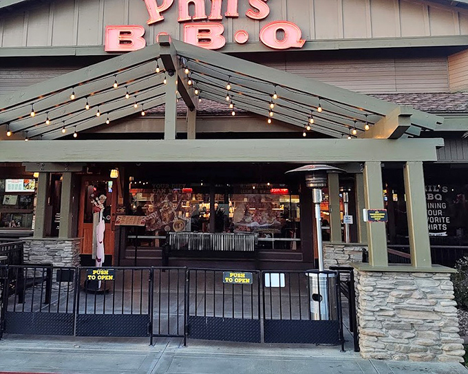 The bustling entrance to Phil's BBQ—where San Diegans willingly wait for ribs that make time stand still.