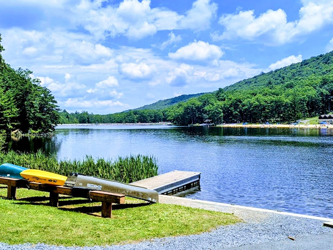 Poe Valley's glassy surface captures cloud reflections so perfect you'll wonder which way is up.