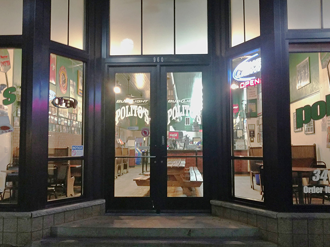 After dark, Polito's glows like a lighthouse for the pizza-starved &ndash; guiding hungry souls toward oversized slices of comfort.