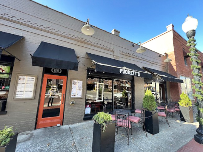 Those simple black awnings and outdoor seating at Puckett's create the perfect spot for people-watching over coffee.