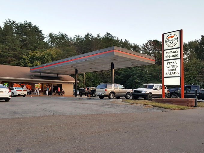 The evening rush at Tennessee Pizza Company's converted station. Cars now fuel up on cheese and pepperoni instead of regular unleaded.